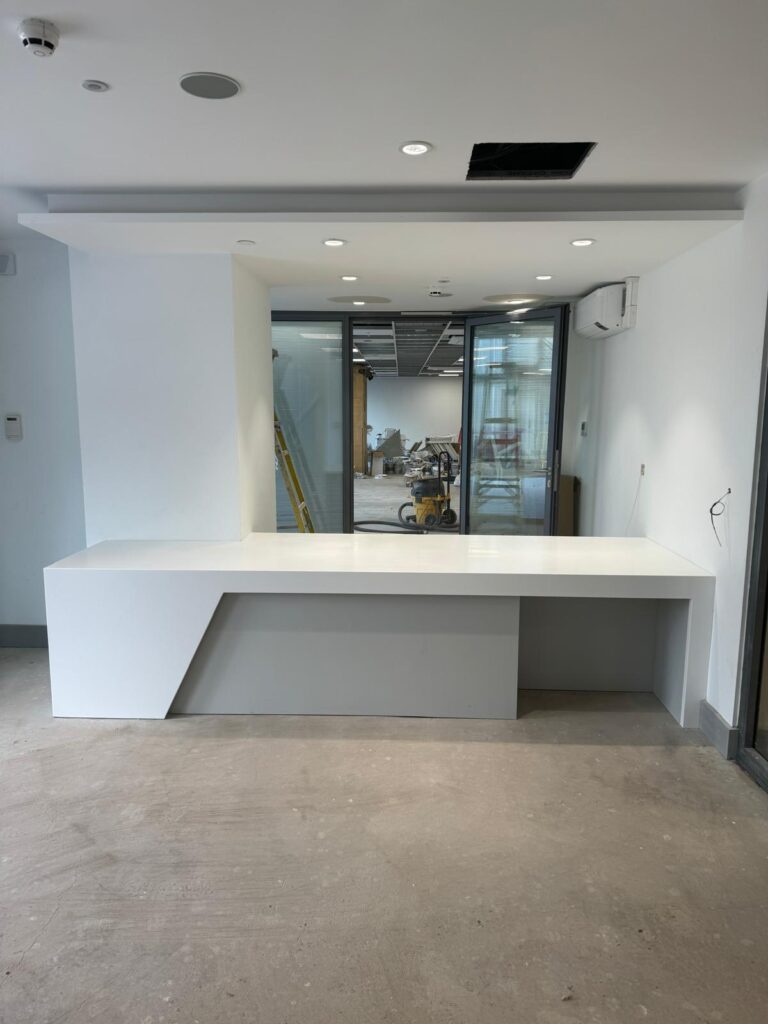 Bespoke fully fitted Corian reception desk for Telford Fire Station ...